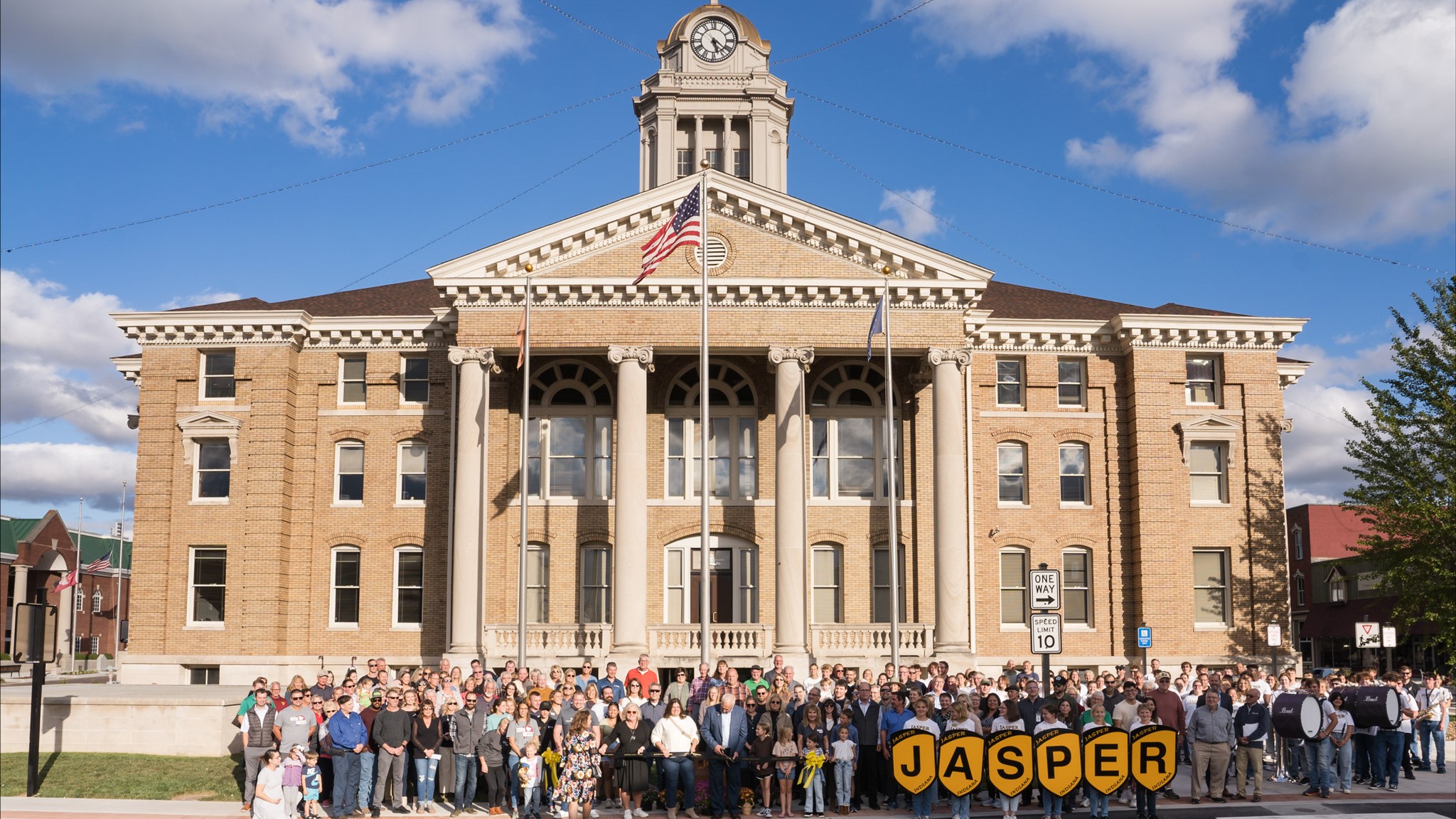 Residents gather to celebrate ribbon cutting of downtown Jasper square ...
